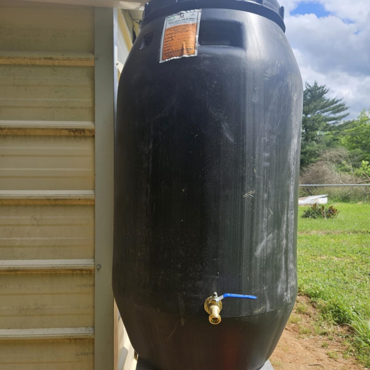 Making A DIY Rain Barrel - Lintukoto Homestead